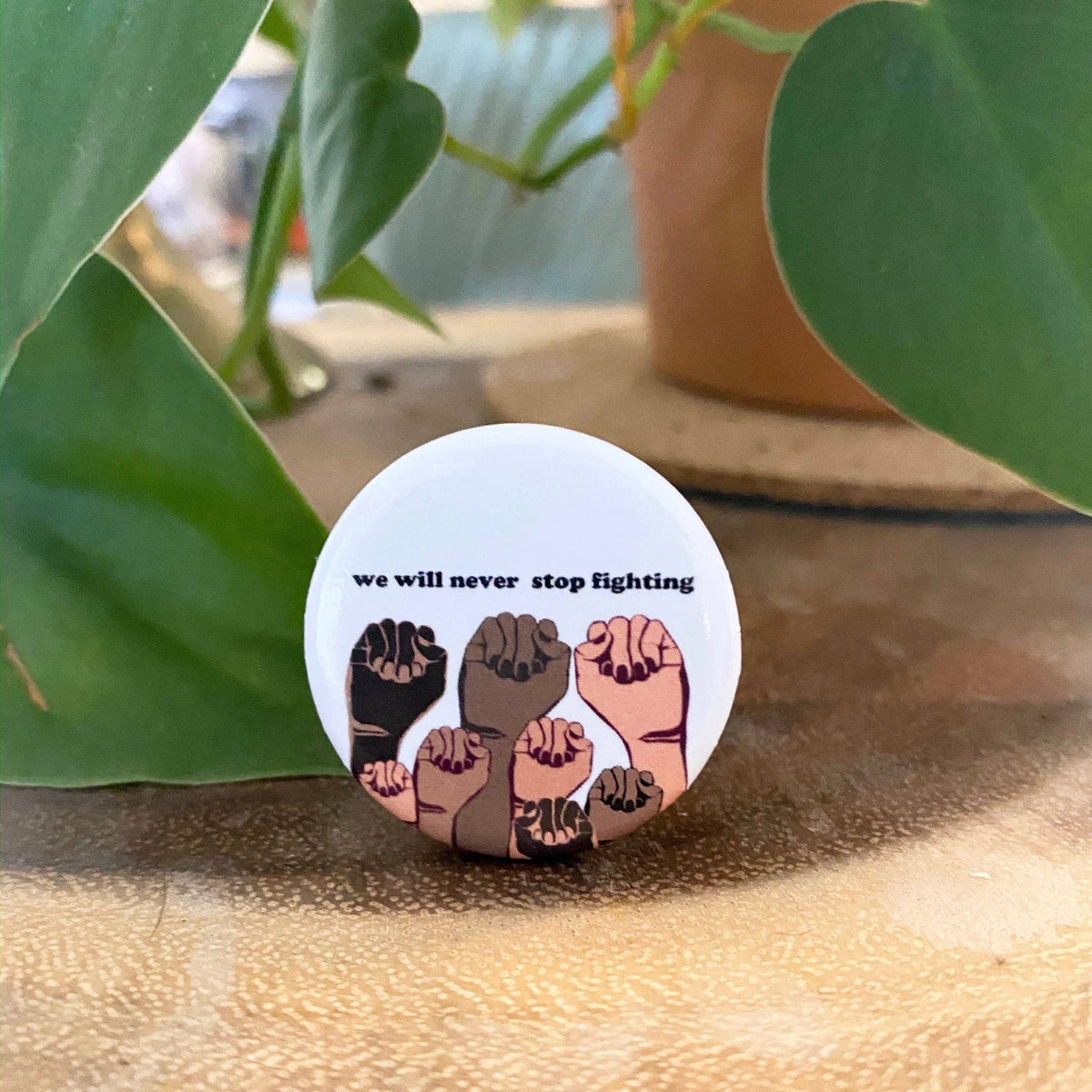 We Will Never Stop Fighting Button – STASH